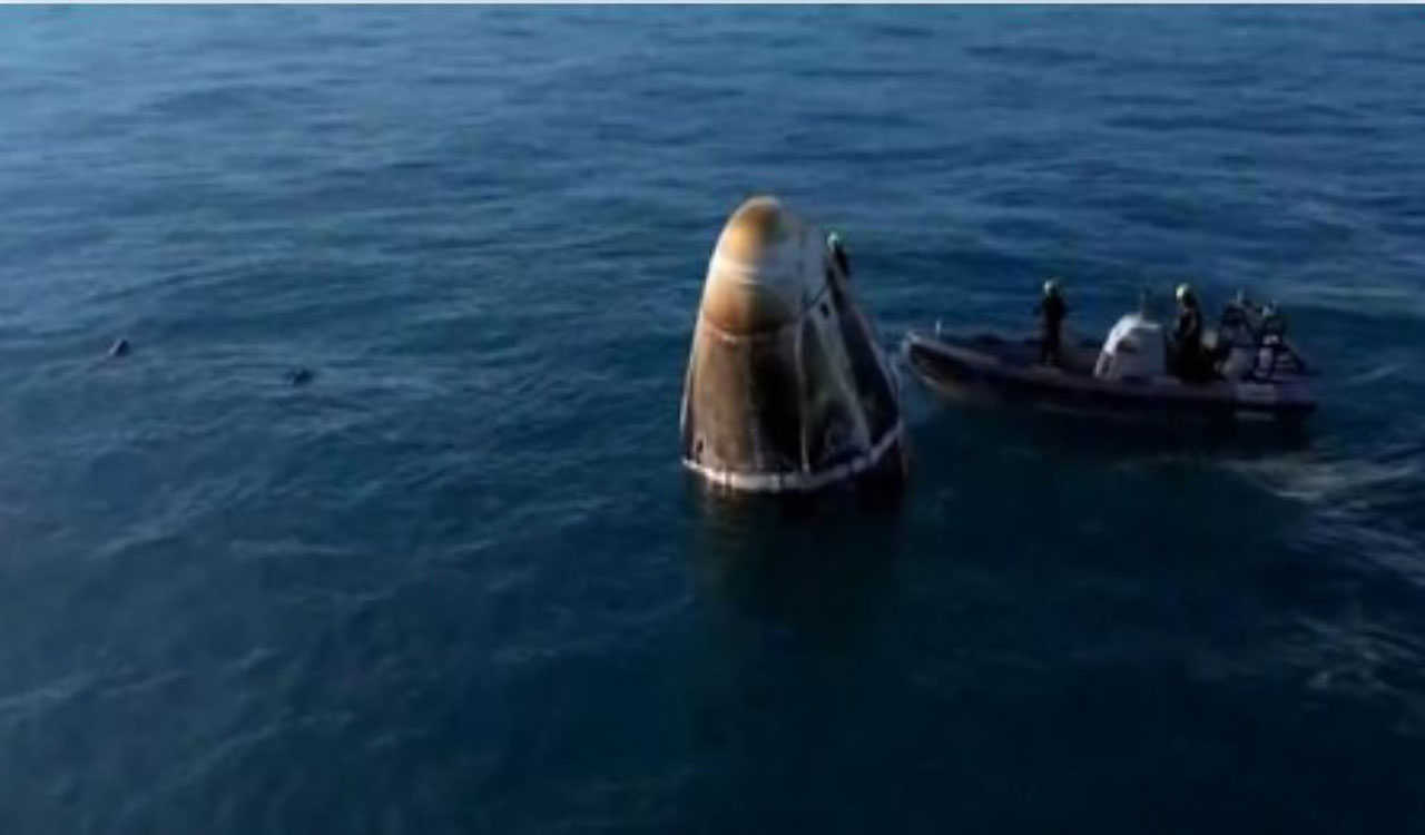 Unplanned welcome: Dolphins greet astronauts as they return home after ... Unplanned welcome: Dolphins greet astronauts as they return home after ...